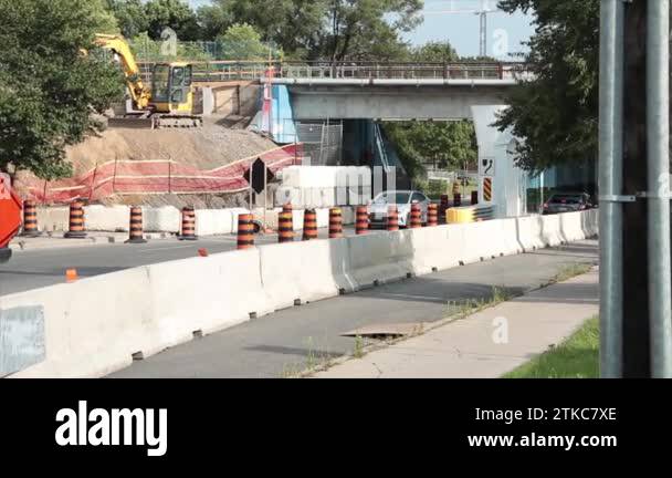construction traffic cars vehicles cement concrete barricades barriers ...