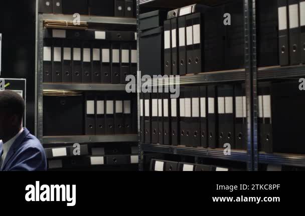 Determined private investigators discussing and doing extensive ...