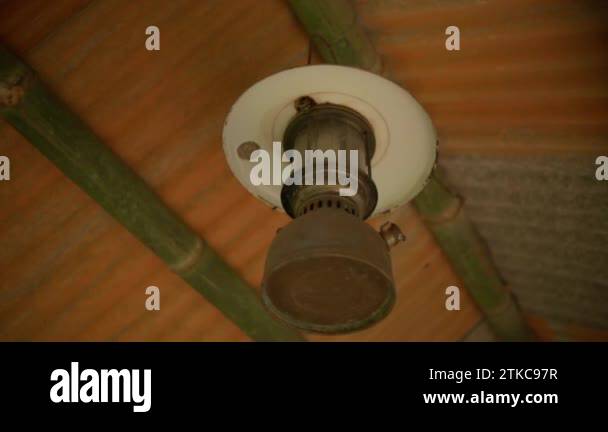 A Traditional fire torch hanging off the ceiling with vintage style in ...