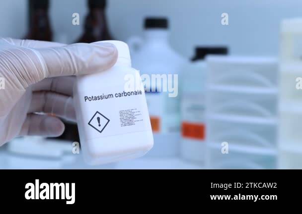 Potassium carbonate in bottle , chemical in the laboratory and industry ...