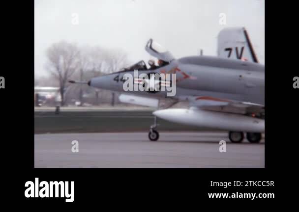 Ground attack fighter taxies onto parking with open canopy. Douglas A-4 ...