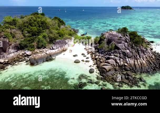 couple on the beach of Kla Island in front of Koh Lipe Island Southern ...