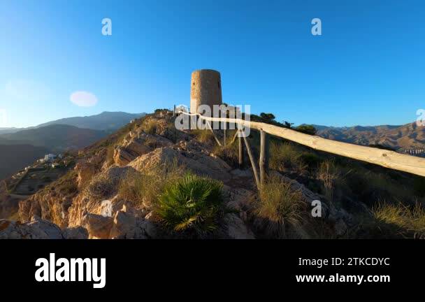 Mediterranean coastal landscape. Historic Torre Vigia De Cerro Gordo, a ...
