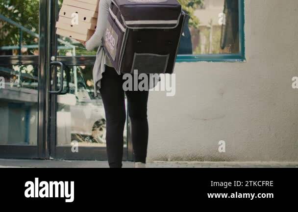 Female carrier dropping pizza packages, sad client crying after dropped ...