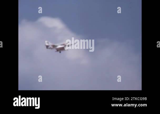 Fighter plane in downwind with extended landing gear prepares to land ...