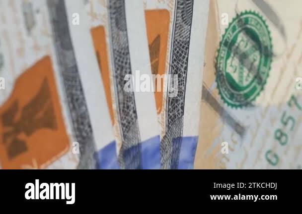 Close-up of a 100 dollar banknote. Camera movement over a 100 dollar ...