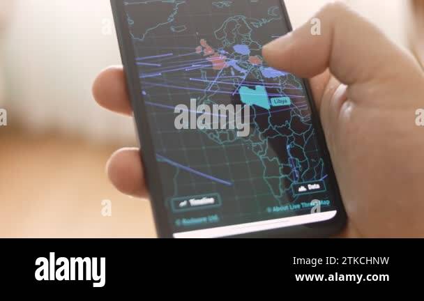 Cyber attack map navigation on smartphone. Displays Show Various ...