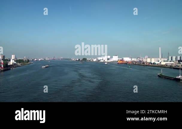 The Netherlands, Rotterdam. Tug boat splashing water - Nieuwe Waterweg ...