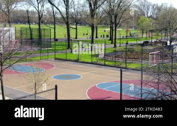 This video shows views of an empty basketball court with rims removed ...