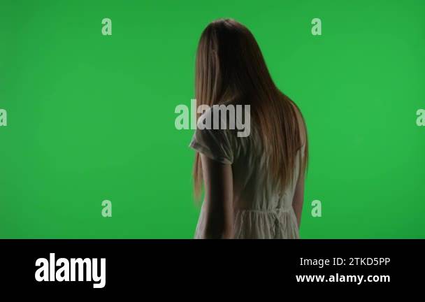 Medium half turn green screen, chroma key video of a posessed female ...
