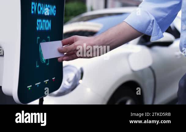 Businessman pay electric vehicles eco-friendly and sustainable energy ...