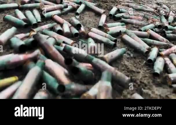 Lots of shell casings from machine gun cartridges at the range in the ...