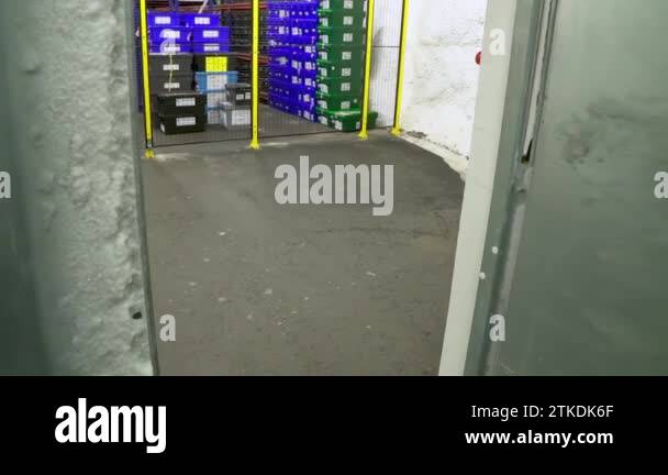 Inside the global seed vault. Shelves with seed boxes, stocks in Global ...