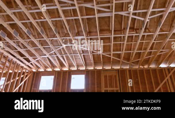Frame system for new house under construction, structure truss beams ...