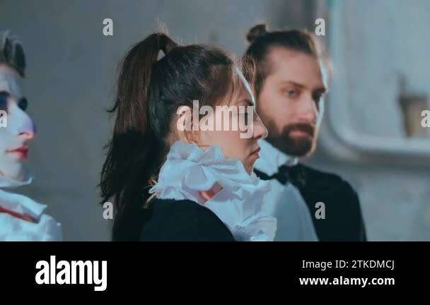 Side view serious concentrated young brunette woman in neck ruff ...