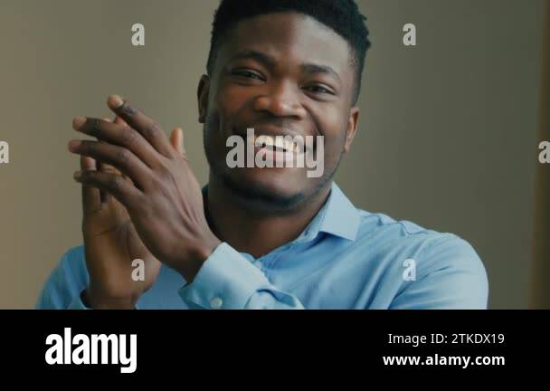 African american happy emotional man winner office worker male ...