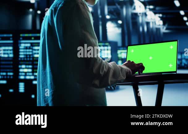 Asian employee using isolated screen laptop to implement artificial intelligence parallel ...