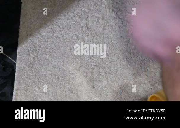 A man runs to the toilet with his pants down, sitting in a toilet stall ...