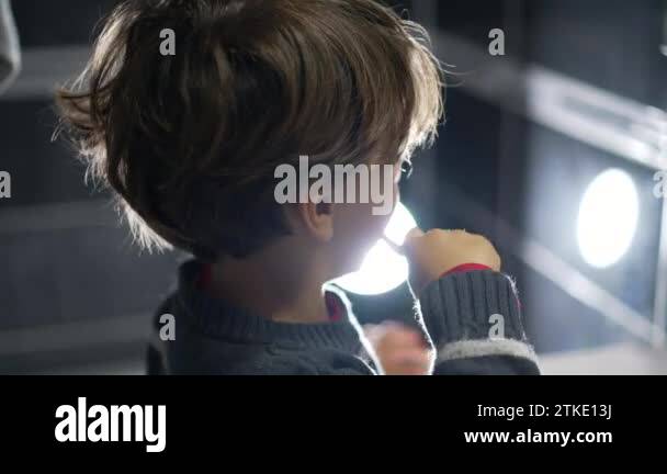 Child brushes teeth at night routine before bed. Little boy brushing ...