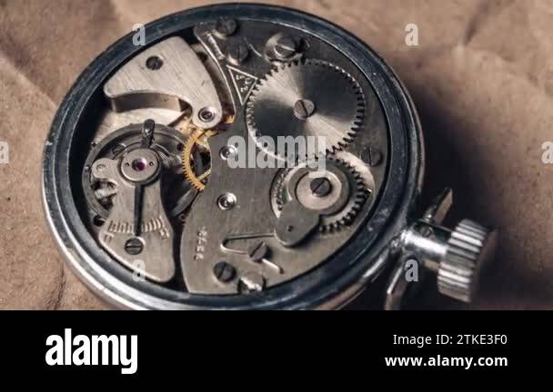 Timelapse of vintage stopwatch mechanism close-up. Round clock watch ...