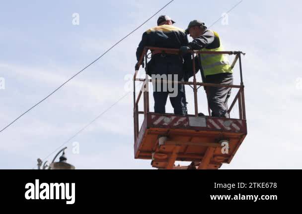 Street light, worker repair, Electric technical. Worker repairing ...