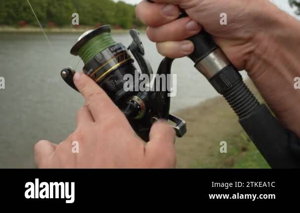 Reeling in a fish Stock Videos & Footage - HD and 4K Video Clips - Alamy