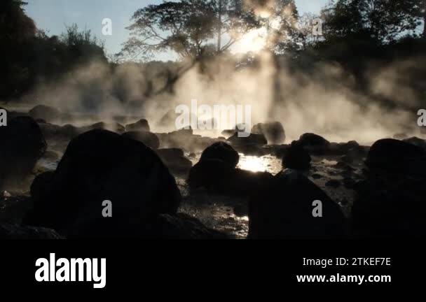 January 8, 2023; Hot springs and fog in Thailand with morning sunlight ...