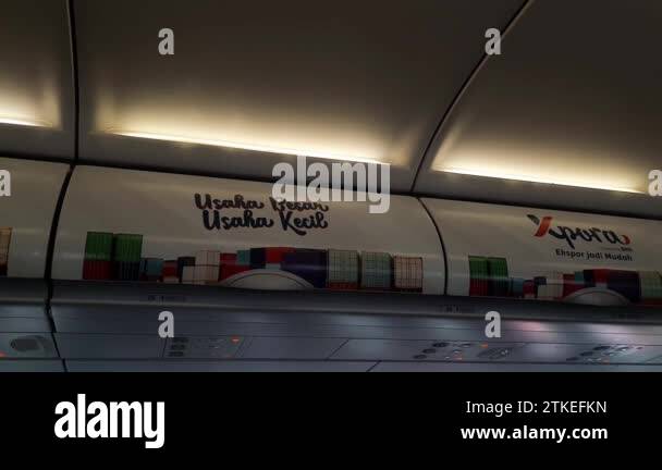 Aircraft cabin with smoke-like air vapor condensation. Water vapor ...