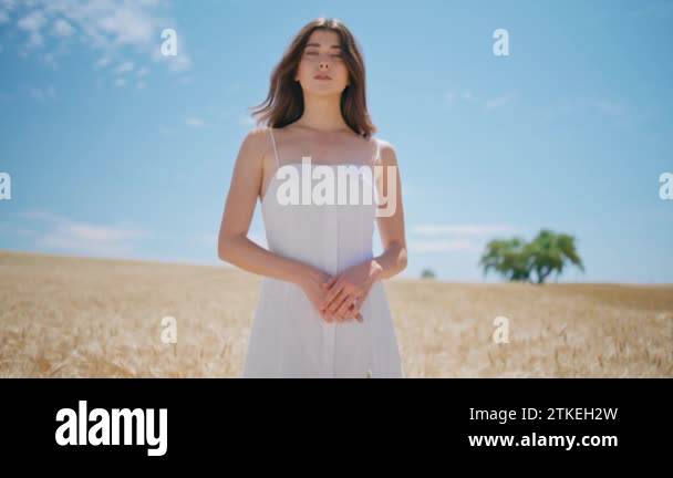 Beautiful model sunny portrait at rural nature. Confident girl looking ...