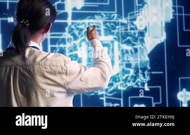 Asian Developer Looking At Hologram Of Artificial Intelligence Cognitive Computing Human Brain 9644