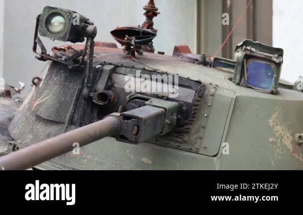 War in Ukraine. Destroyed tank with torn off turret. Broken and burned ...