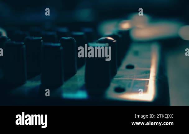 Close-up of fingers adjusting sound mixing console. Mixer console for ...