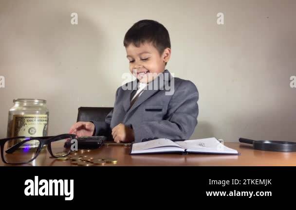 Kid counting coins Stock Videos & Footage - HD and 4K Video Clips - Alamy
