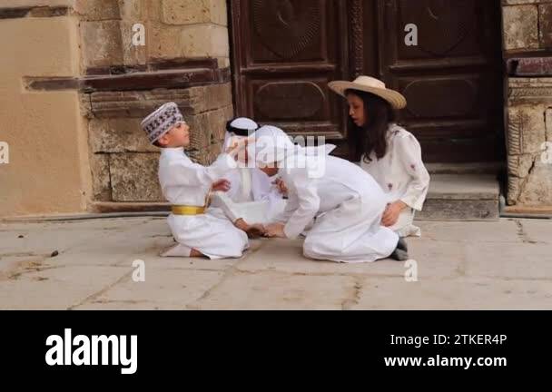 Saudi Arabian kids playing outside the house in Jeddah old town Saudi ...