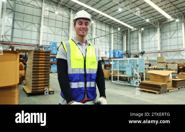 Portrait handsome worker officer caucasian man on duty driving forklift ...