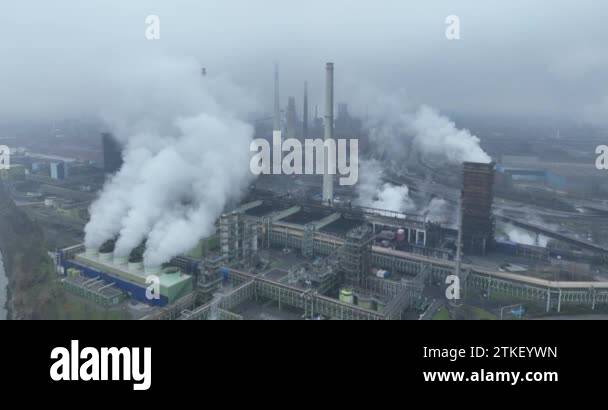 Large factory, smoke, chimney pipe and smog, metal industry, blast ...
