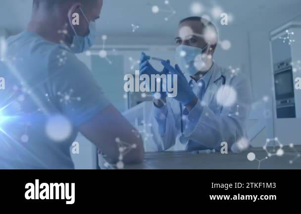 Animation of diverse male doctor with male patient in face masks holding vaccine over molecules ...