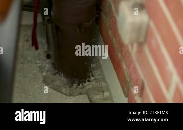 Overflowing drainage downpipe and overfilled infiltration shaft during ...