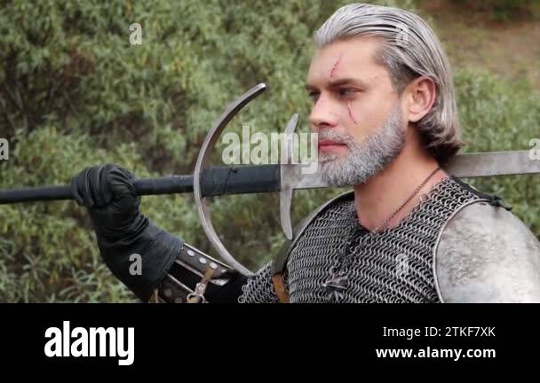 Portrait of a medieval warrior with gray hair and a scar on his face in ...