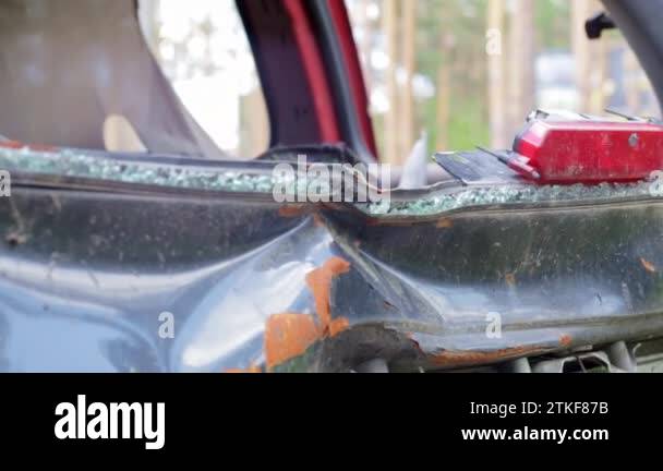 A car after an accident with a broken rear window. Broken window in a ...