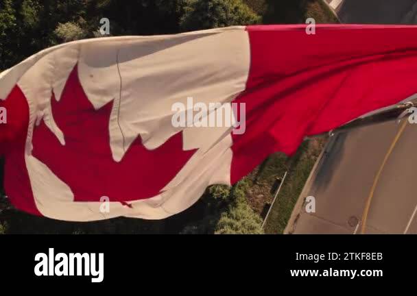 Canadian flag slow motion at mast. National Flag of Canada. Celebration ...