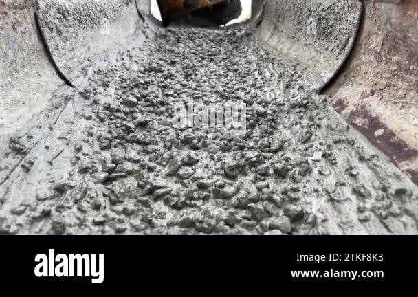 Pouring concrete mix on concreting form work. Forming, an essential ...