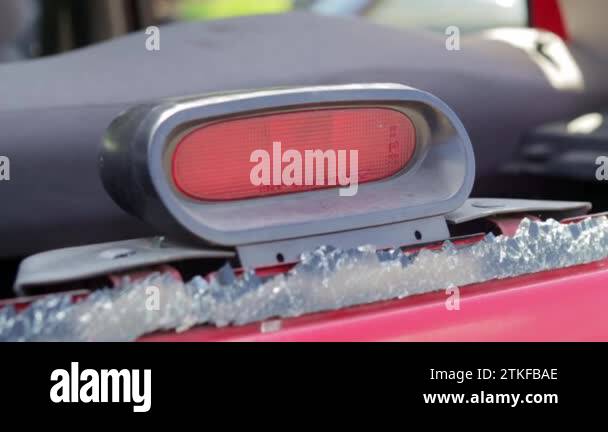 Red car after an accident with a broken rear window. Broken window in a ...