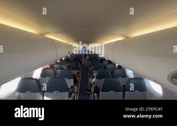 Passengers seated airplane cabin Stock Videos & Footage - HD and 4K ...