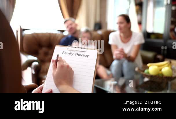 Mother child father on family therapy communicate with psychotherapist ...