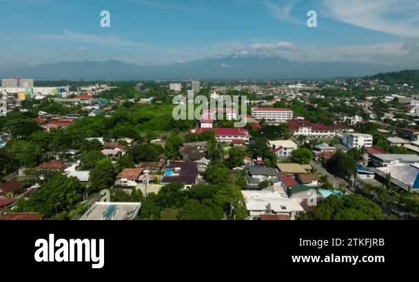 Cityscape of Davao City with buildings and green trees. Mindanao ...