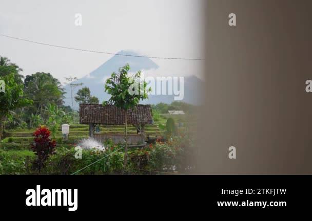 Mount Merapi, an active volcano in Yogyakarta, Indonesia is seen from a ...