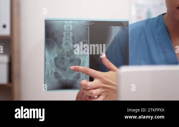 Female doctor talks to patient remotely at online appointment via ...