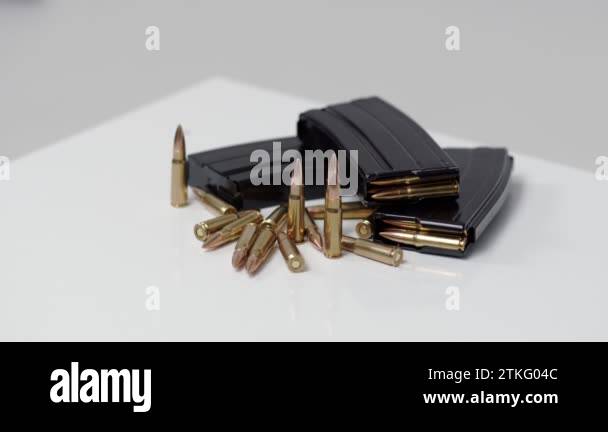 Black iron modern army military machine gun and cartridges, small arms ...