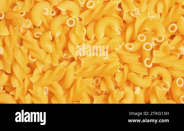Uncooked Fusilli and Chifferi Rigati Pasta - Top View. Fat and ...